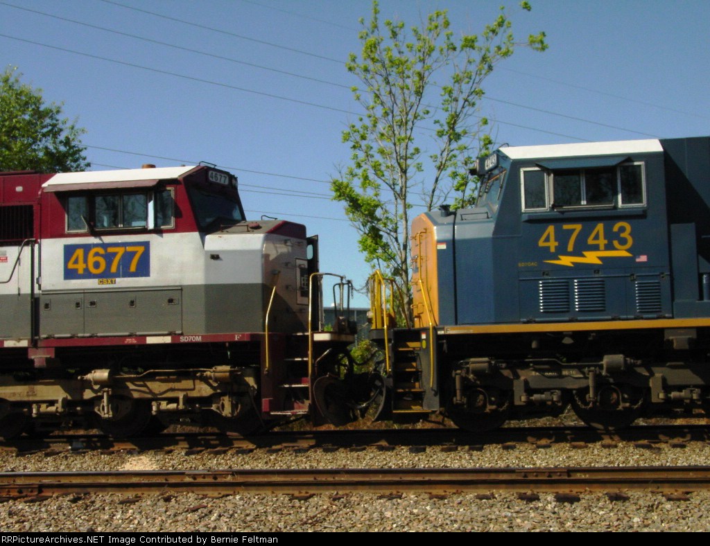 CSX SD70M #4677 (former EMDX #7002) coupled to CSX SD70MAC #4743 in the consist of a Waycross ...